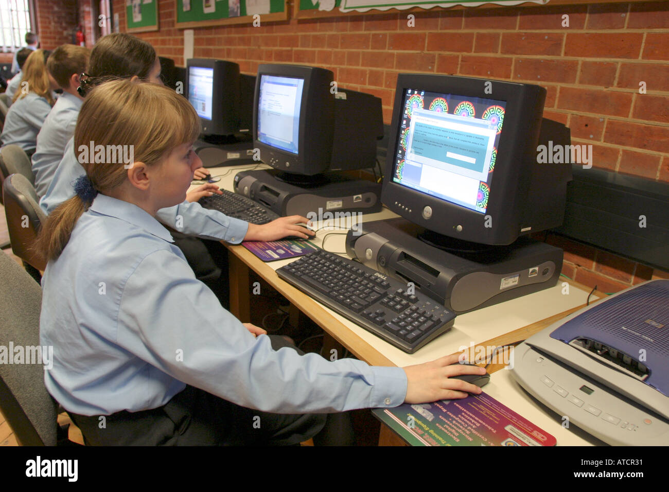 young girl using Computer at independent school Stock Photo - Alamy