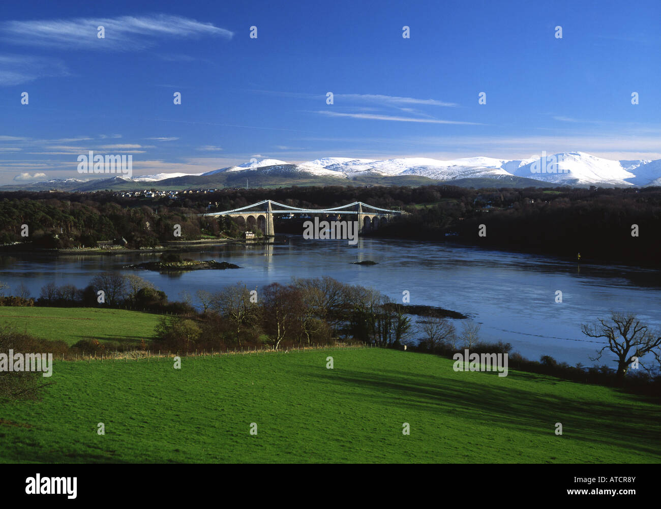 Menai Suspension Bridge Snowdonia in snow in background Anglesey ...