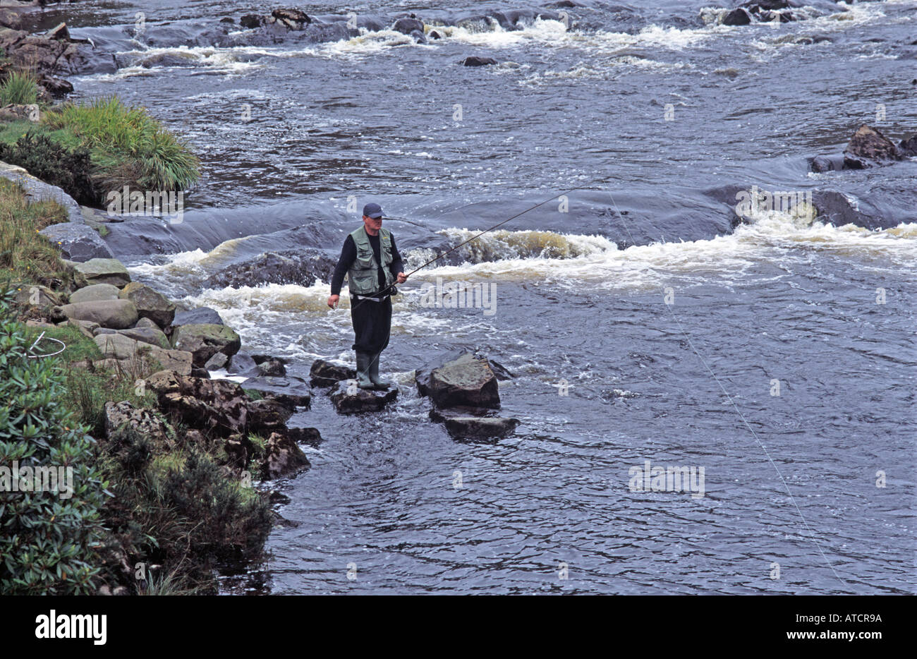 Fisherman at Aasleagh Falls, on the Erriff river, Mayo Ireland Stock ...