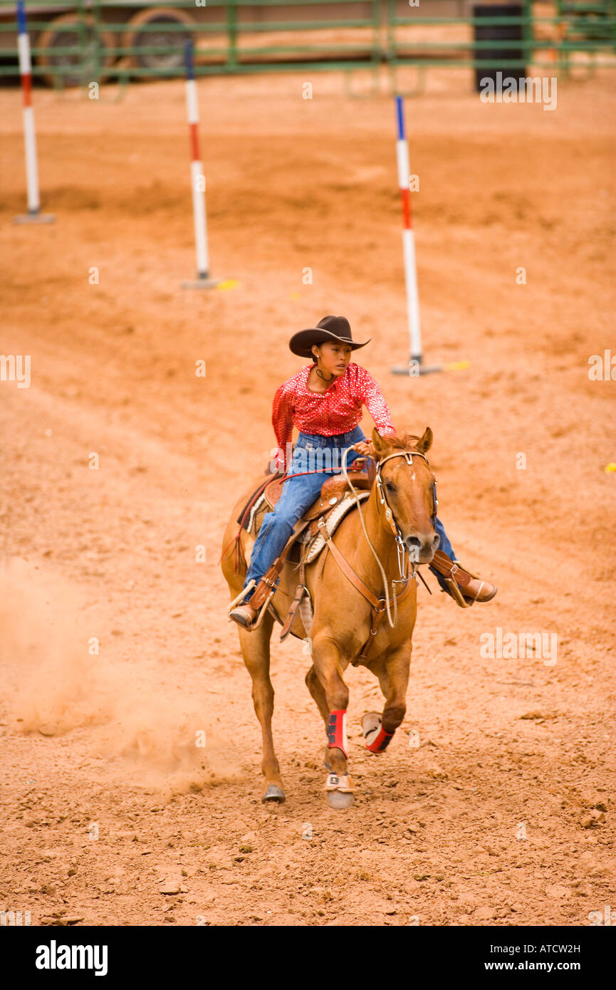young rider compete in the Pole Bending event All Indian Rodeo Gallup ...