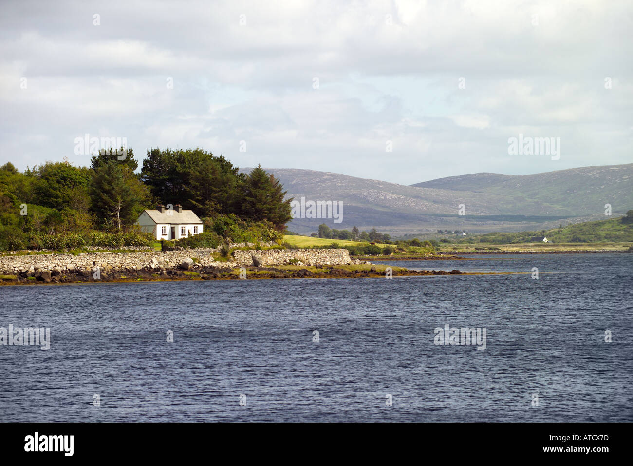 Cottage surrounded by trees Connemara West Coast Ireland Stock Photo ...