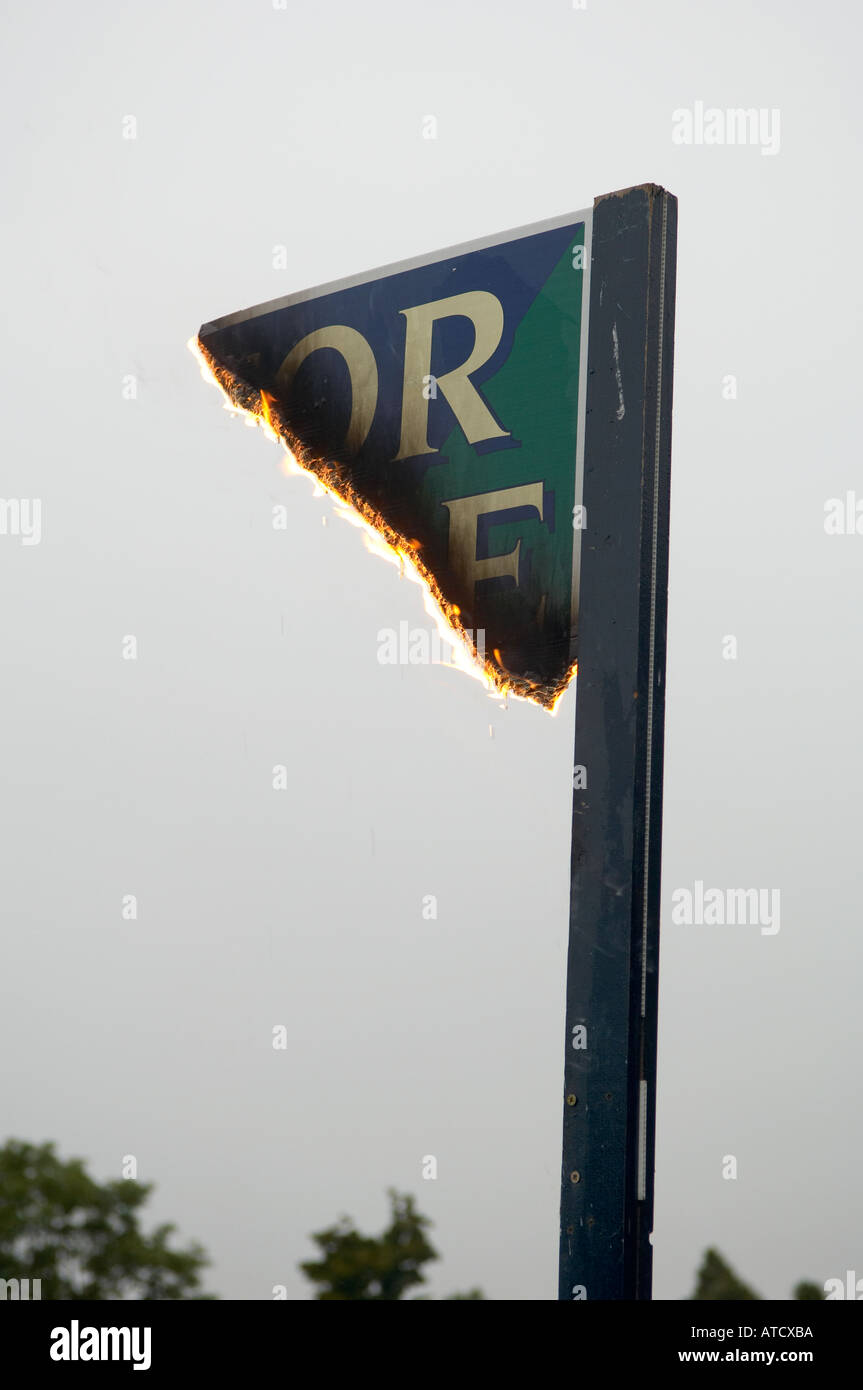 For sale sign on fire Stock Photo - Alamy