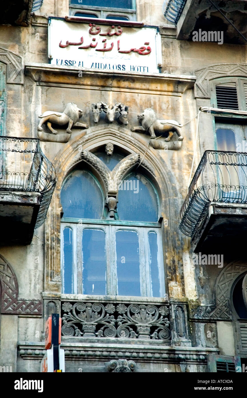 Elaborate and intricate, building facade with carved lions, in old city ...