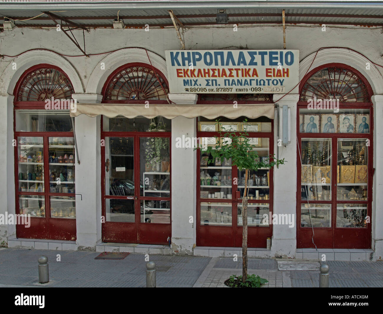 storefront with shop window of a little shop selling icons and other ...