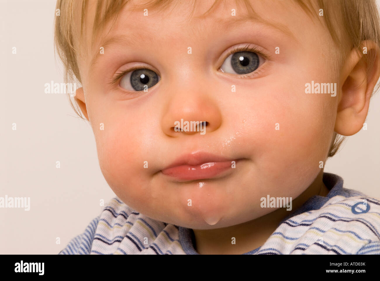 Baby boy dribbling hi-res stock photography and images - Alamy