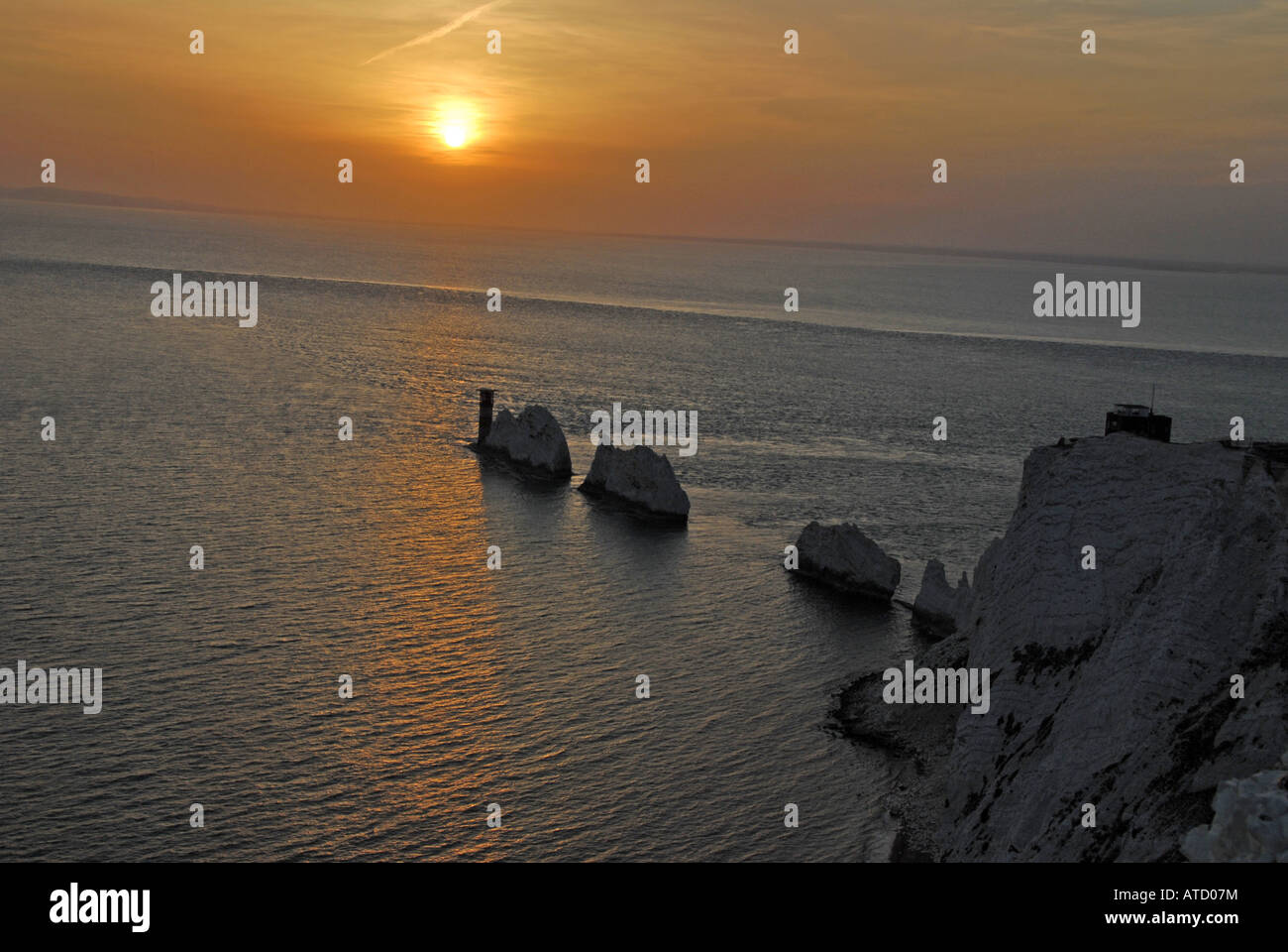 Sun setting over The Solent and the Isle of Wight's famous landmark ...