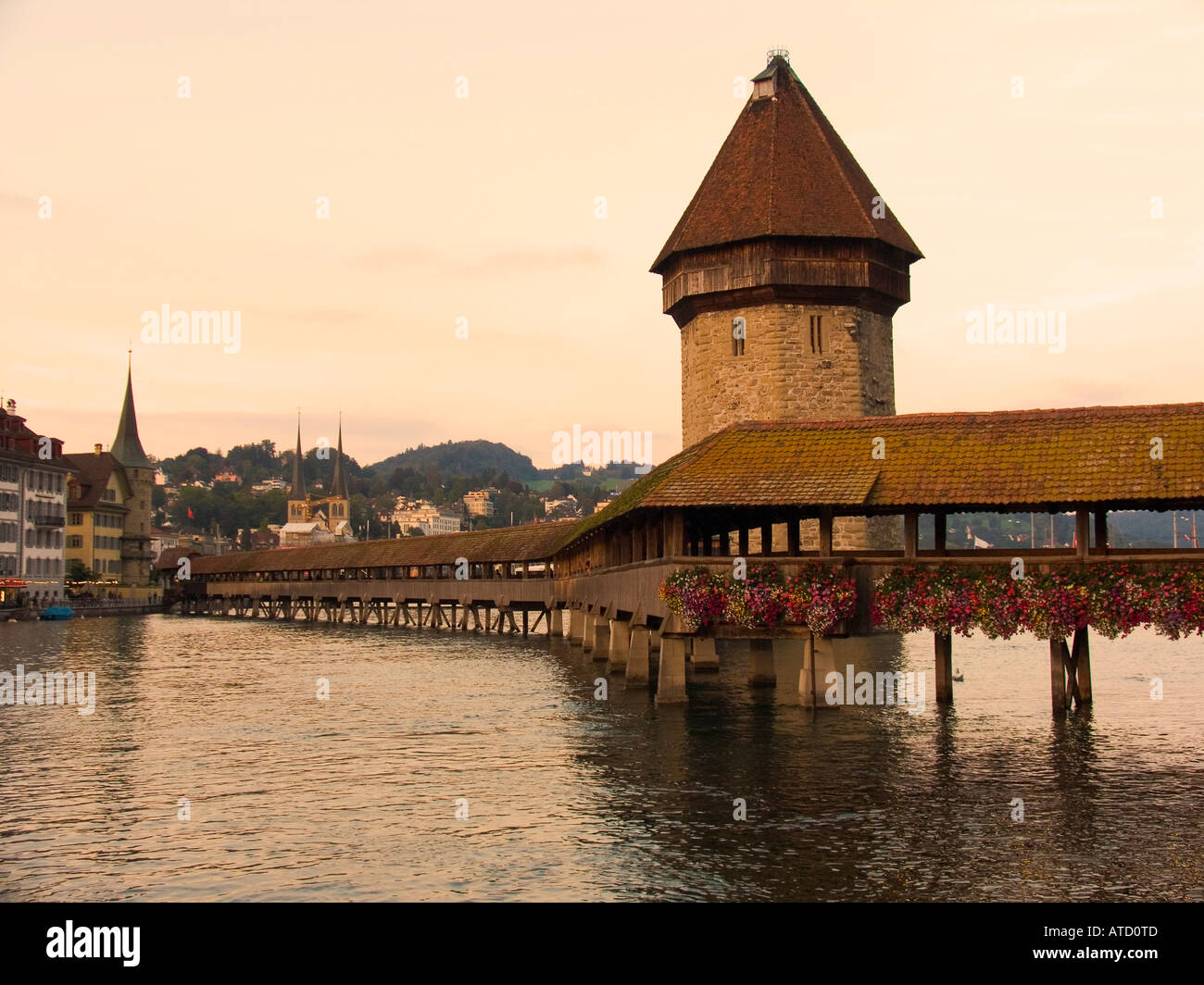 Chapel Bridge and water tower at sunset Old Town Reuss River Luzern ...