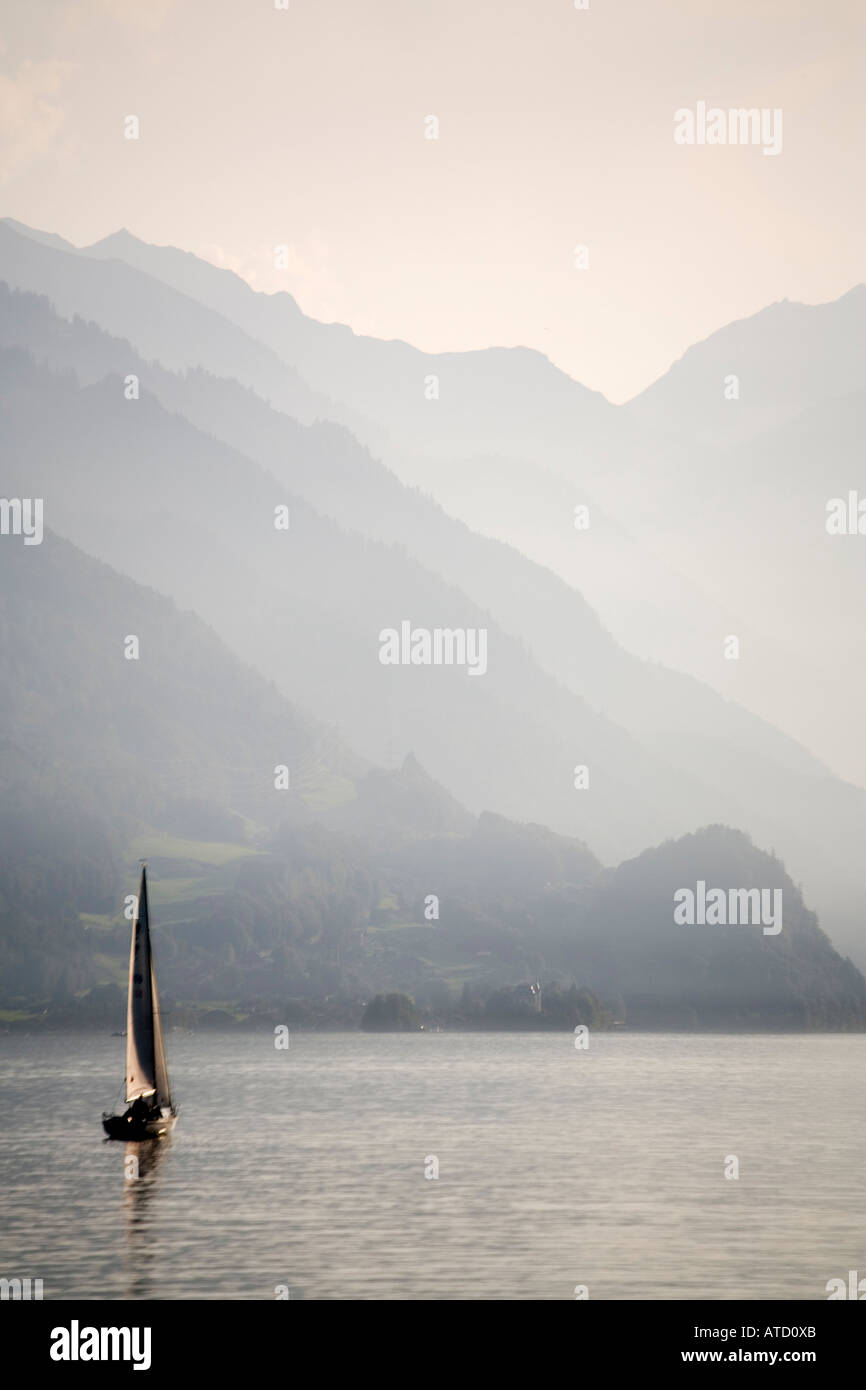 Sailboat at sunset on the Brienzersee Brienz Switzerland Stock Photo ...