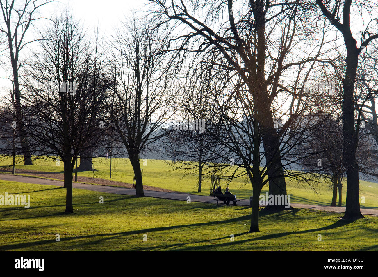 Couple relaxing on Sunday afternoon in early Spring in Christchurch ...