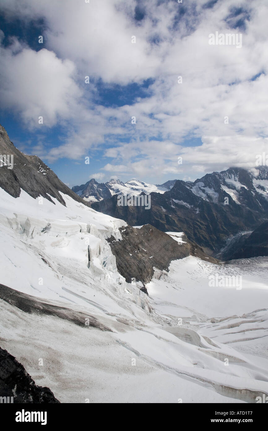 View of Alps and glaciers from viewing window inside the Eiger on train ...
