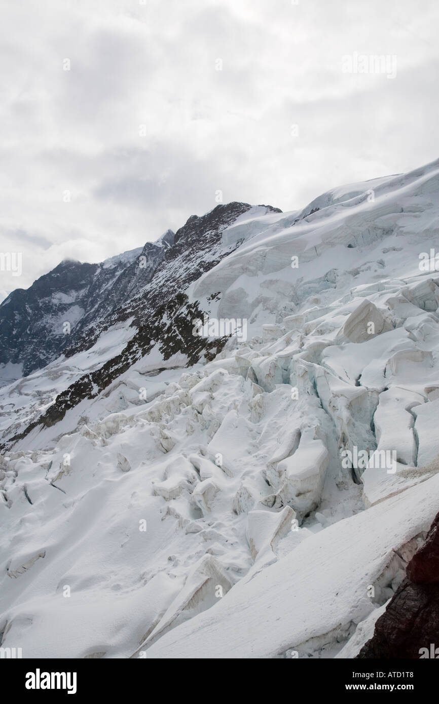 View of Alps and glaciers from viewing window inside the Eiger on train ...