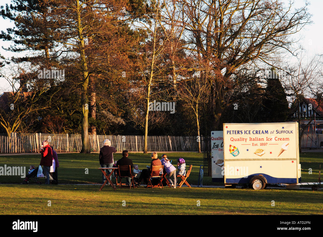 Family relaxing on Sunday afternoon in early Spring in Christchurch ...