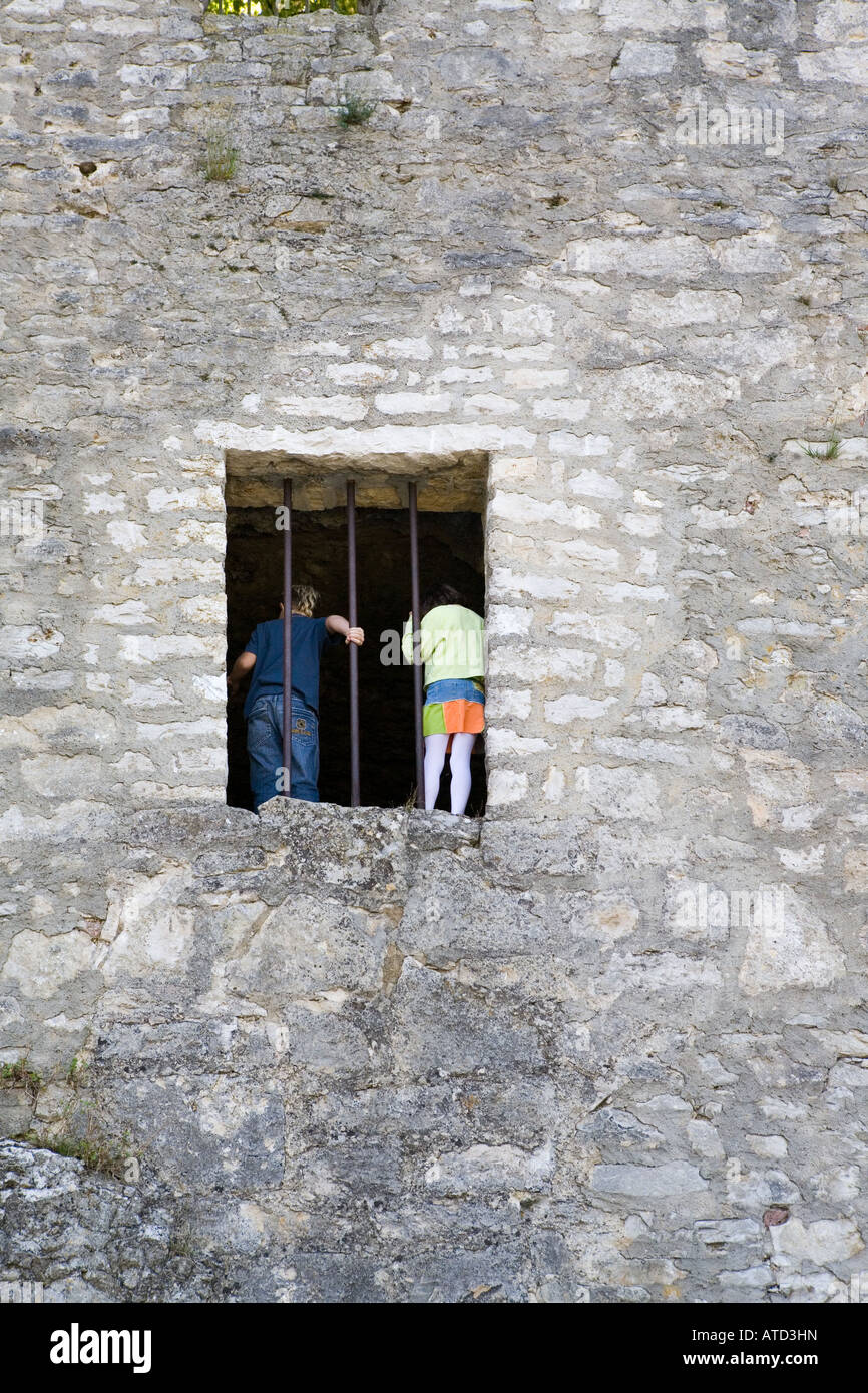 castle wall with window and bars Stock Photo - Alamy