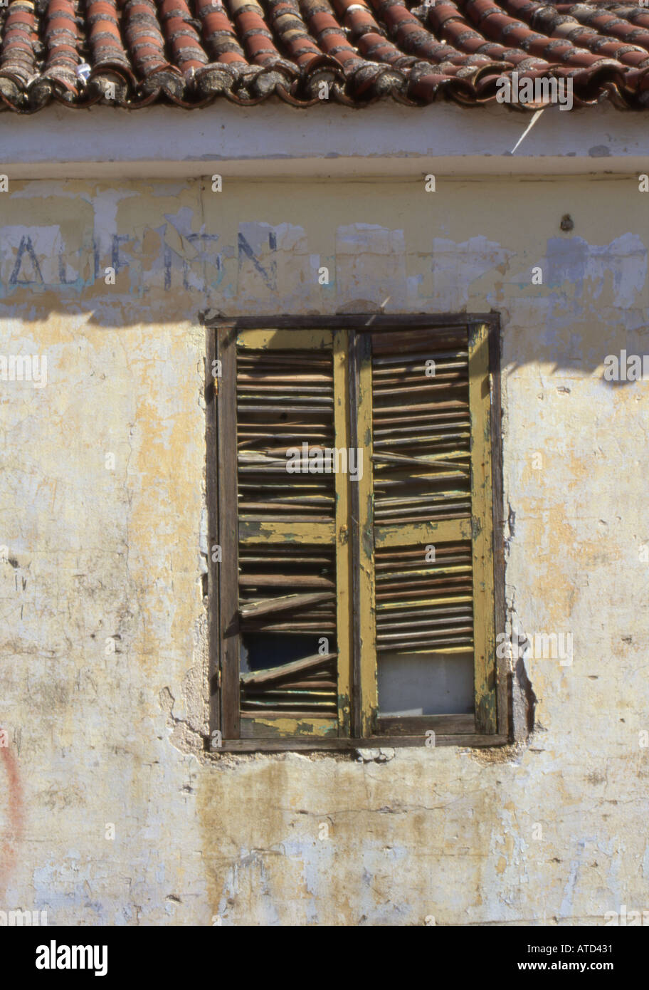 Wrecked Greek window shutters number 1825 Stock Photo - Alamy