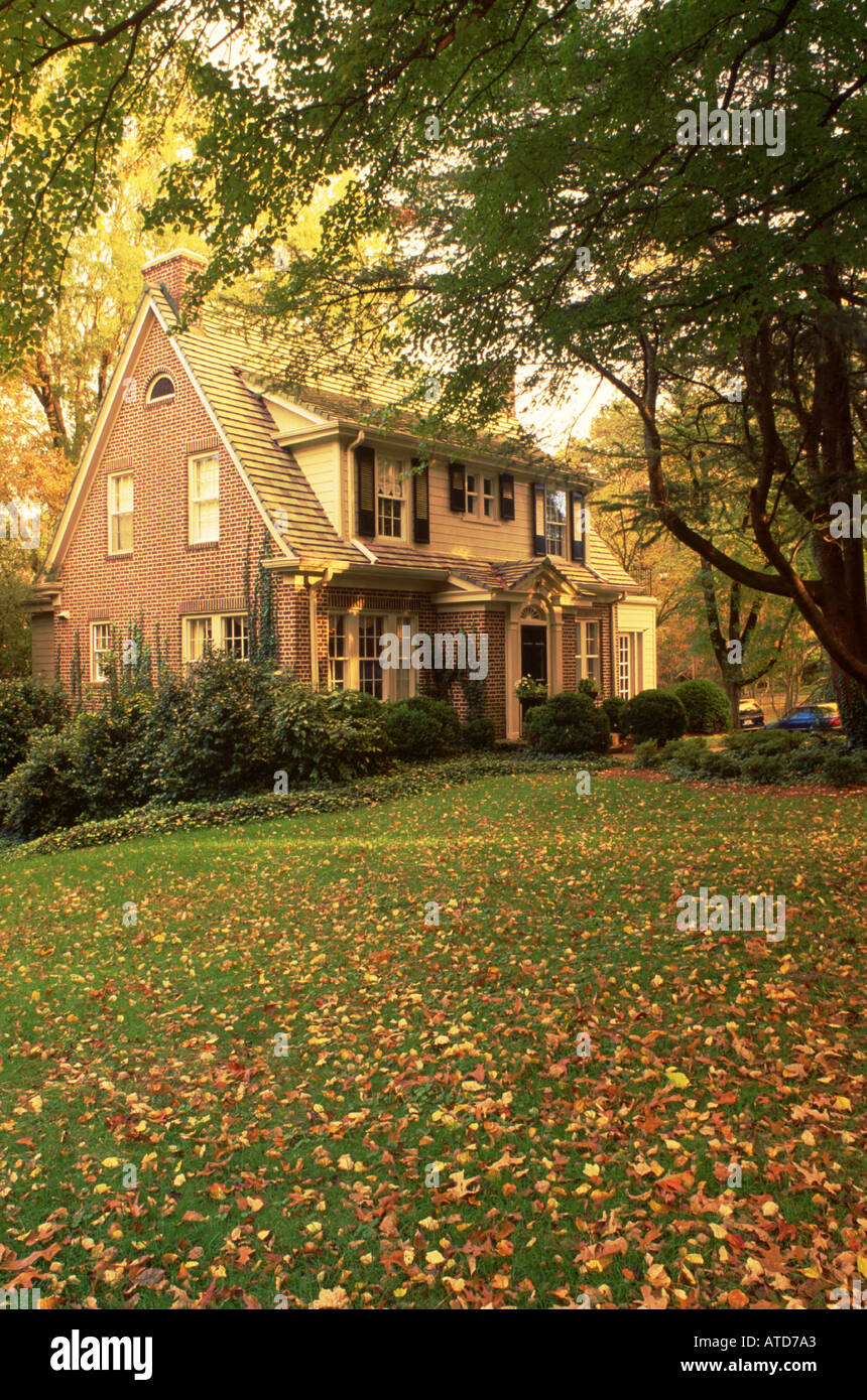 Two story brick home in the fall Stock Photo - Alamy