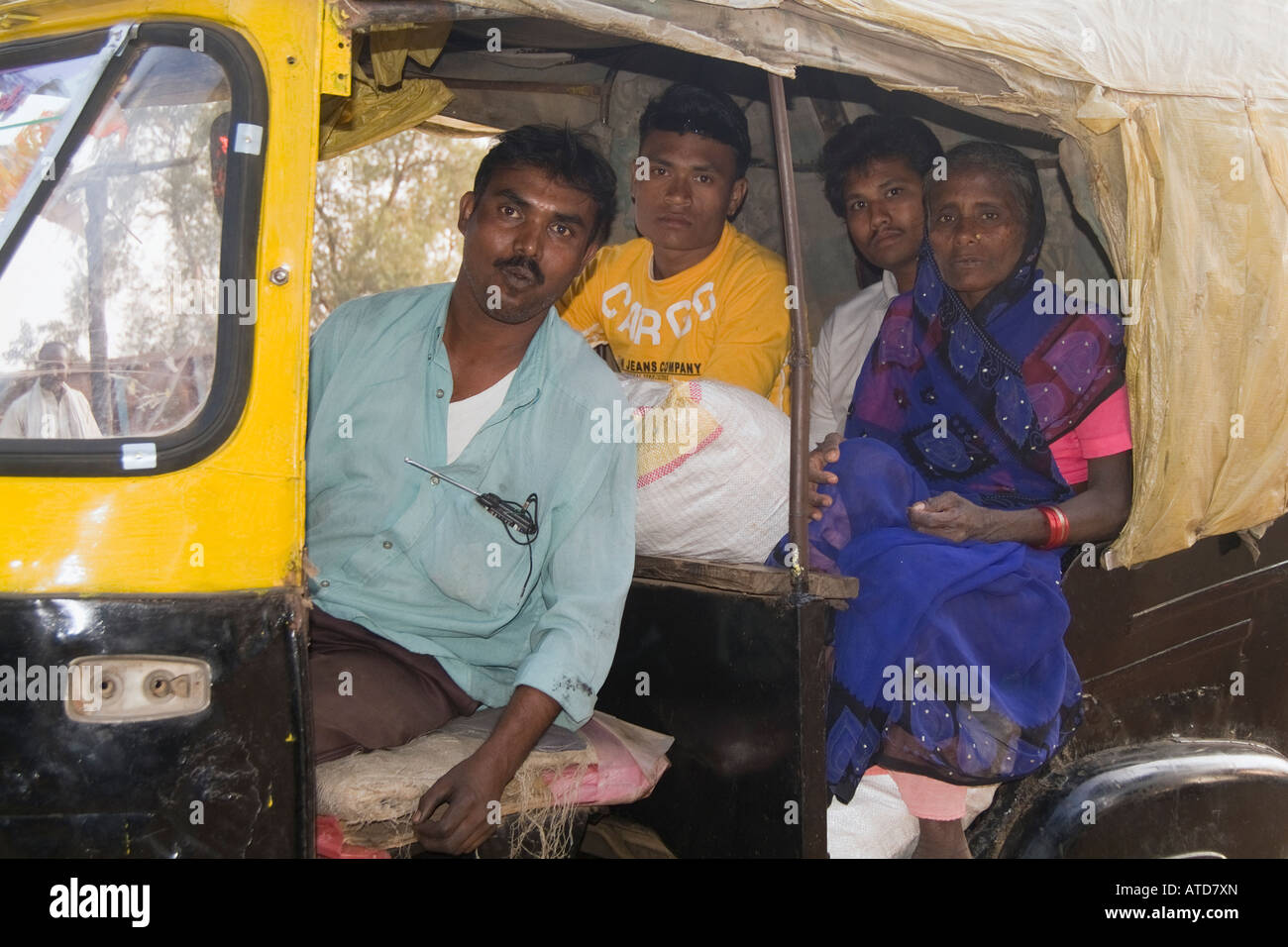 People in a rickshaw India Stock Photo - Alamy