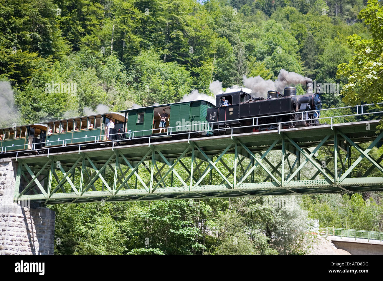 Railway bridge with steam engine and trailer Stock Photo - Alamy