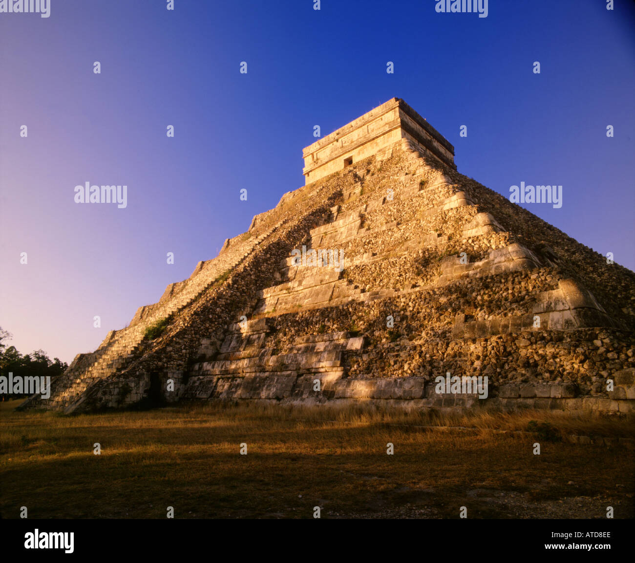 The Pyramid At Chichen Itza on the Yucatan Peninsula of Mexico glows as ...