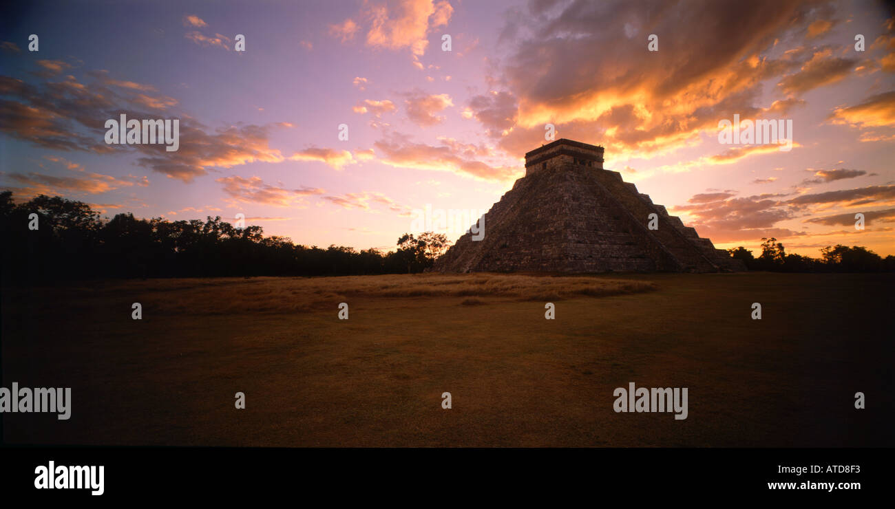 The sun sets behind the Pyramid At Chichen Itza on the Yucatan ...
