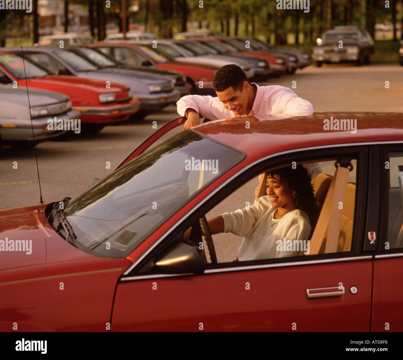 People looking cars hi-res stock photography and images - Alamy