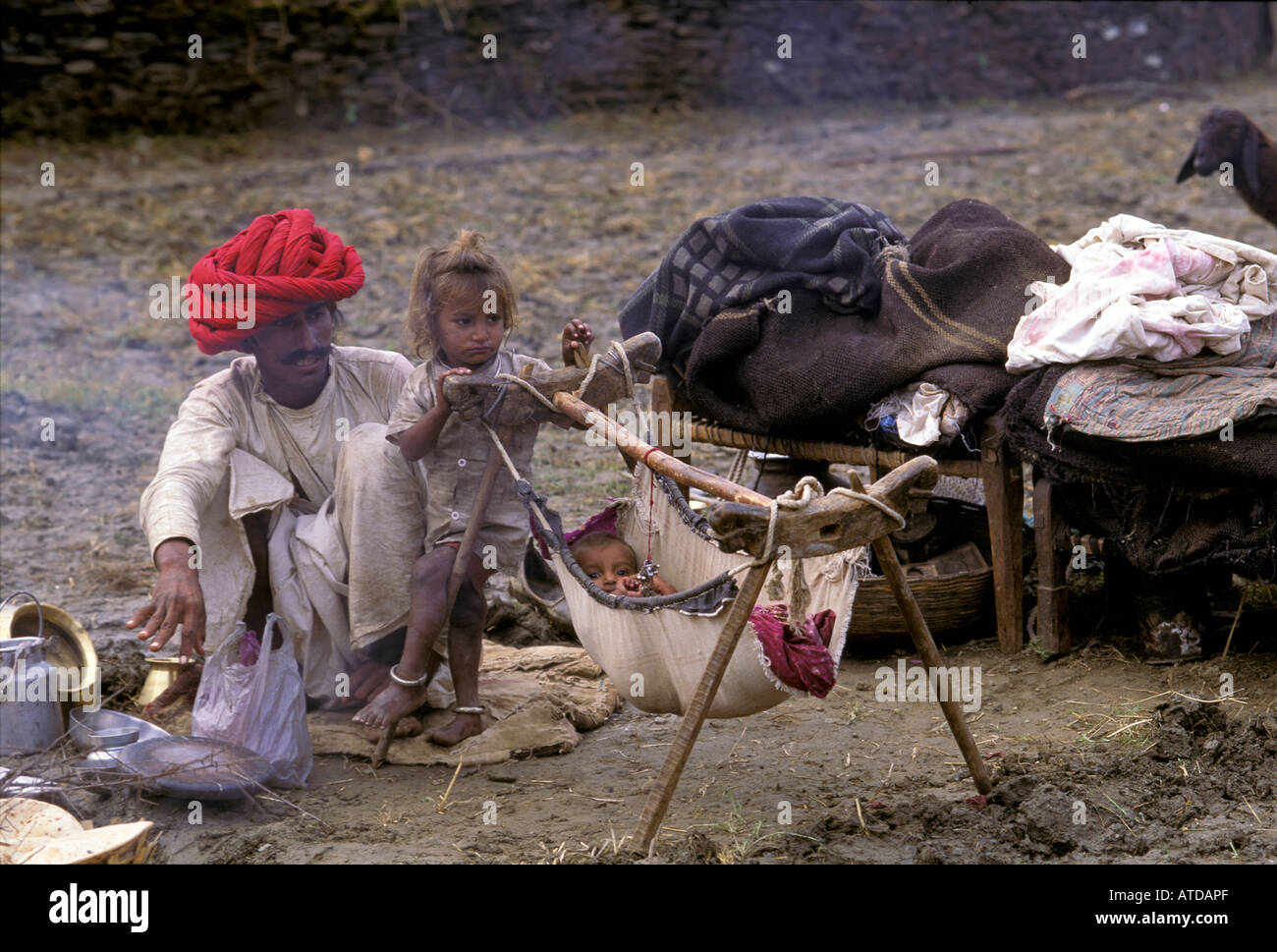 Marwa nomads father with child and baby, Rajasthan, India Stock Photo ...