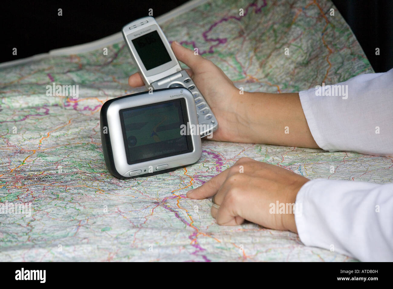 Navigation with map and navigation equipment Stock Photo - Alamy