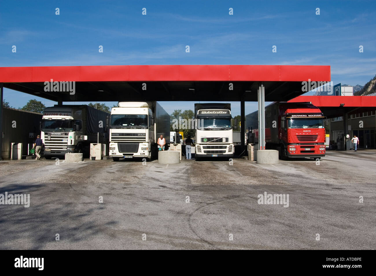 Trucks at gas station Stock Photo - Alamy