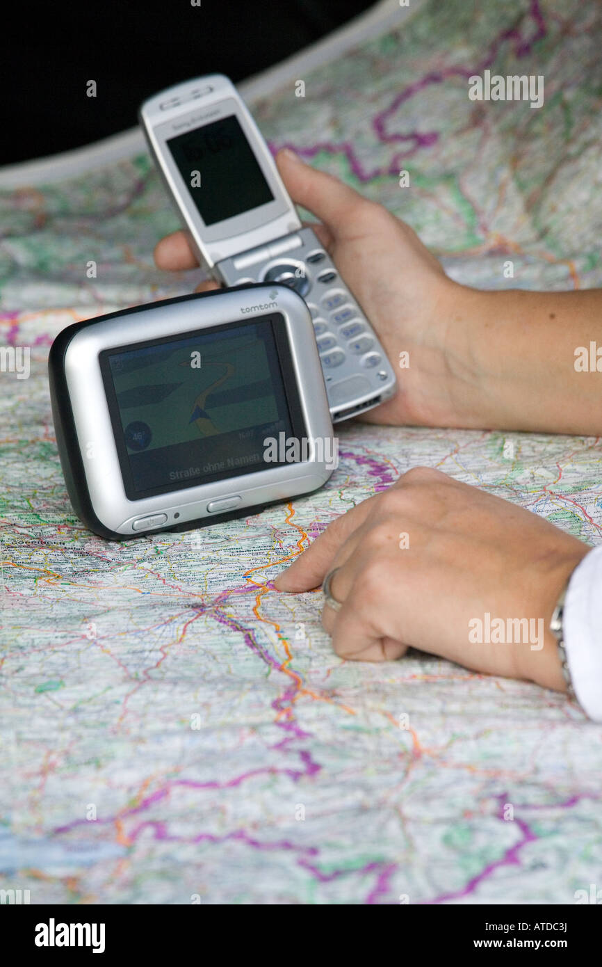 Navigation with map and navigation equipment Stock Photo - Alamy