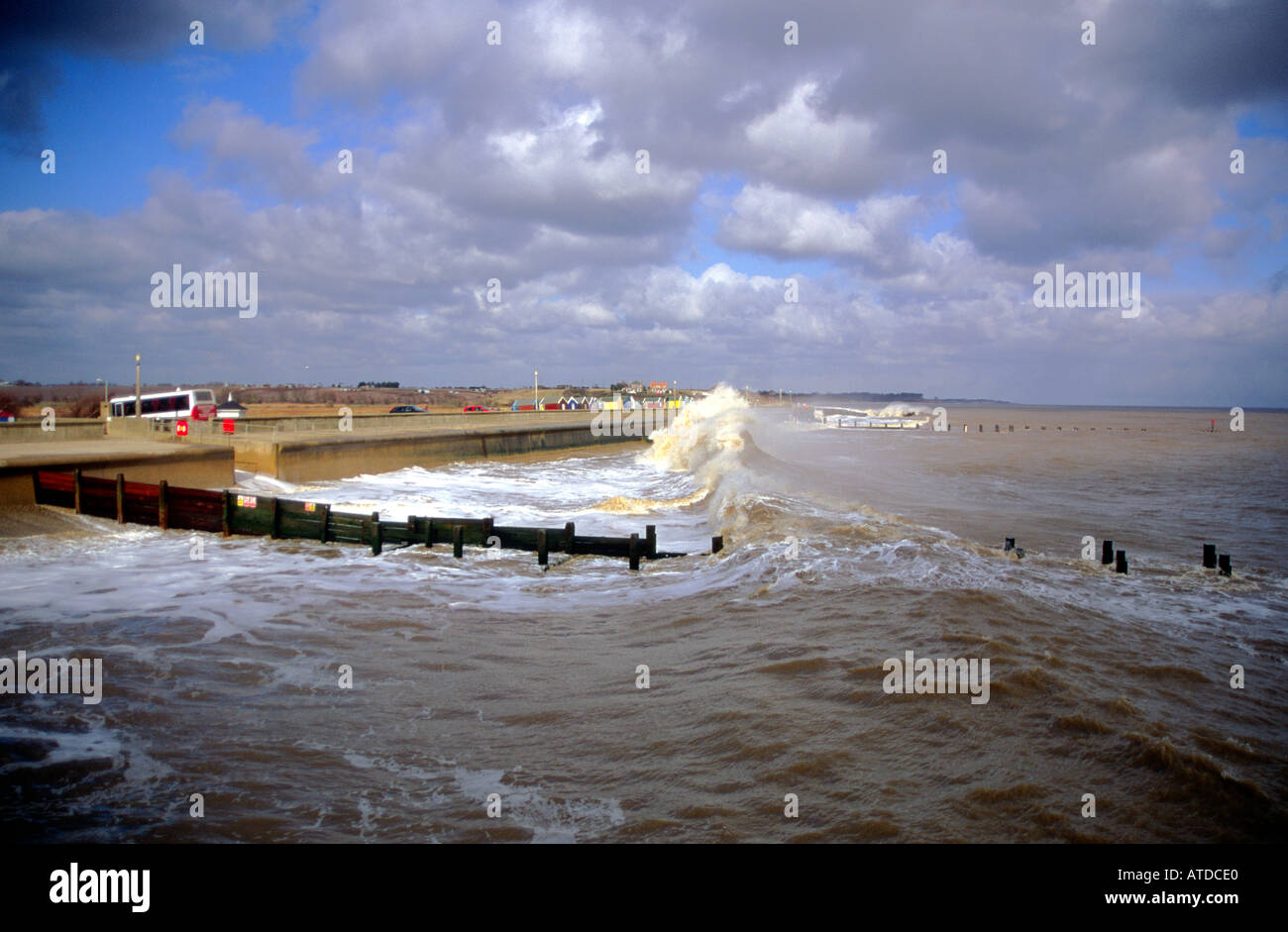 Large lateral wave built up by wave return wall Southwold Suffolk Stock ...