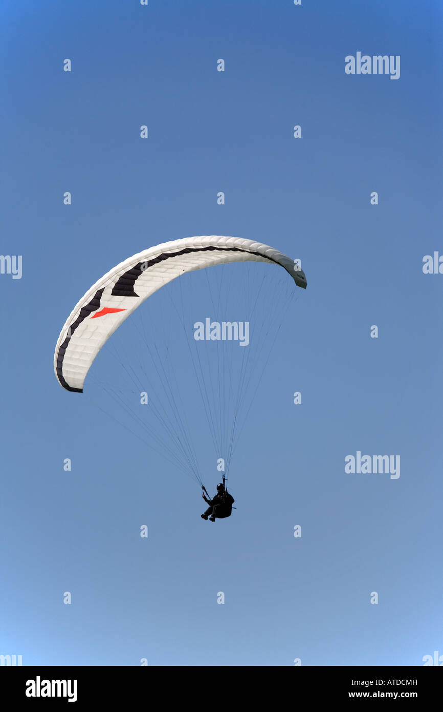 Paraglider and windsock Stock Photo - Alamy