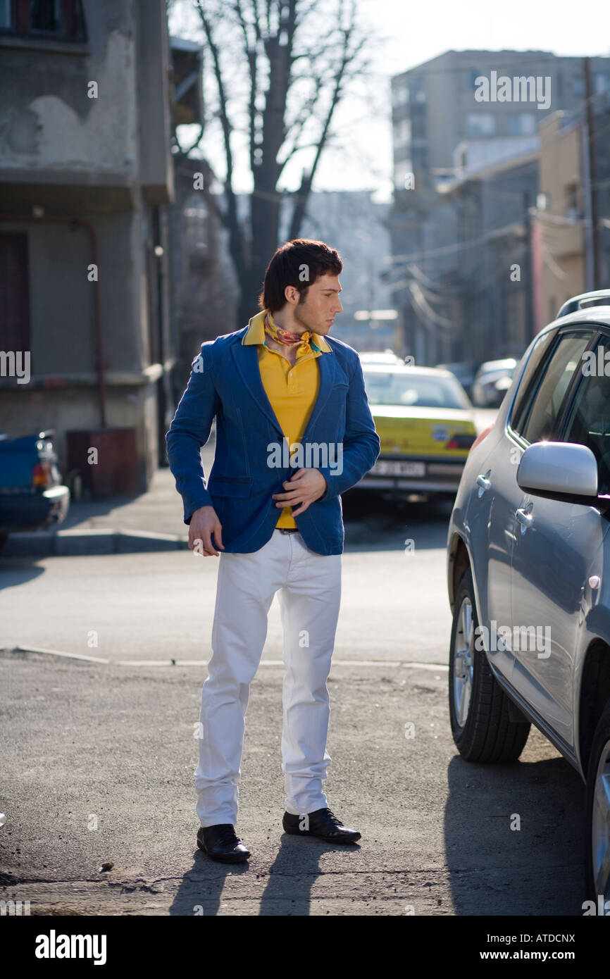 Elegantly dressed man standing hi-res stock photography and images - Alamy