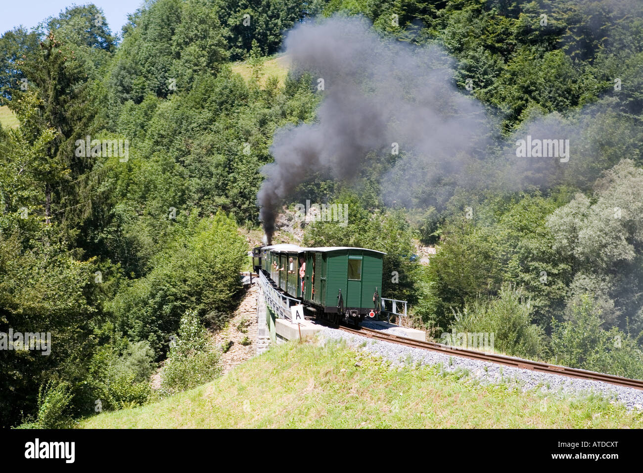 Railway bridge with steam engine and trailer Stock Photo - Alamy