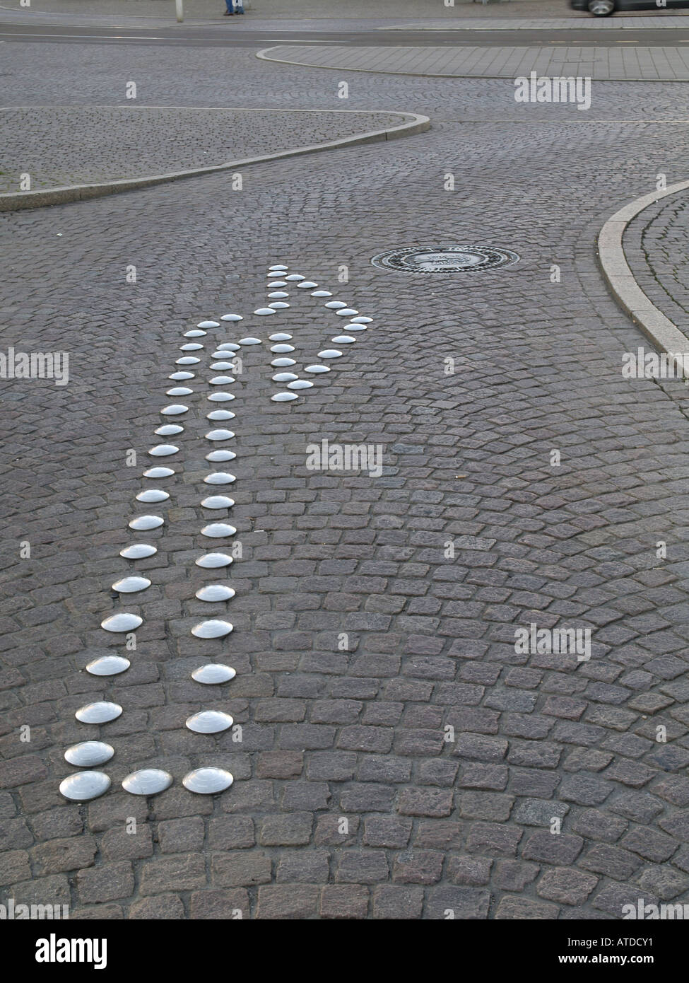 Directional-arrow on a street Stock Photo - Alamy