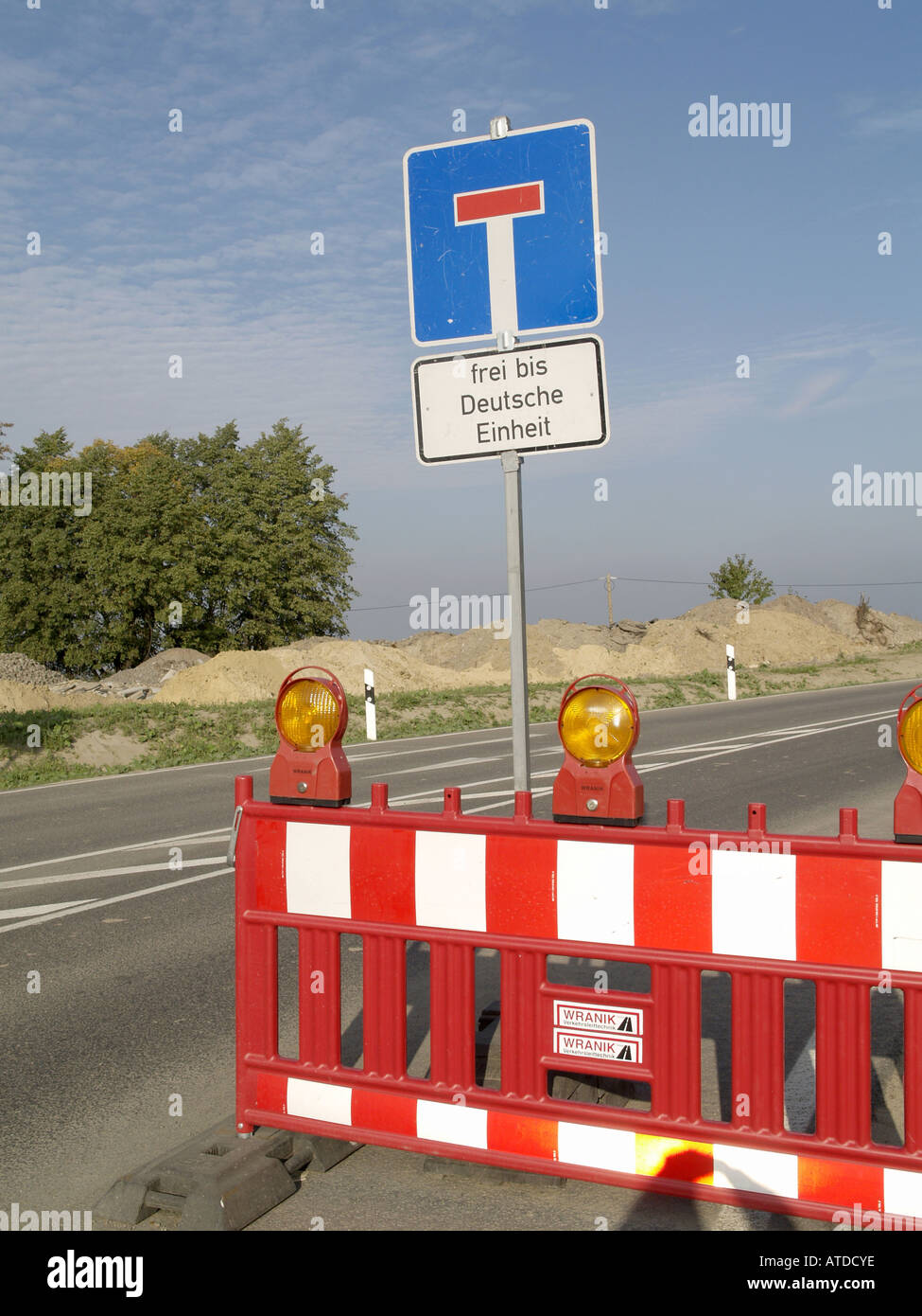 Sign dead end, free until German unification Stock Photo - Alamy
