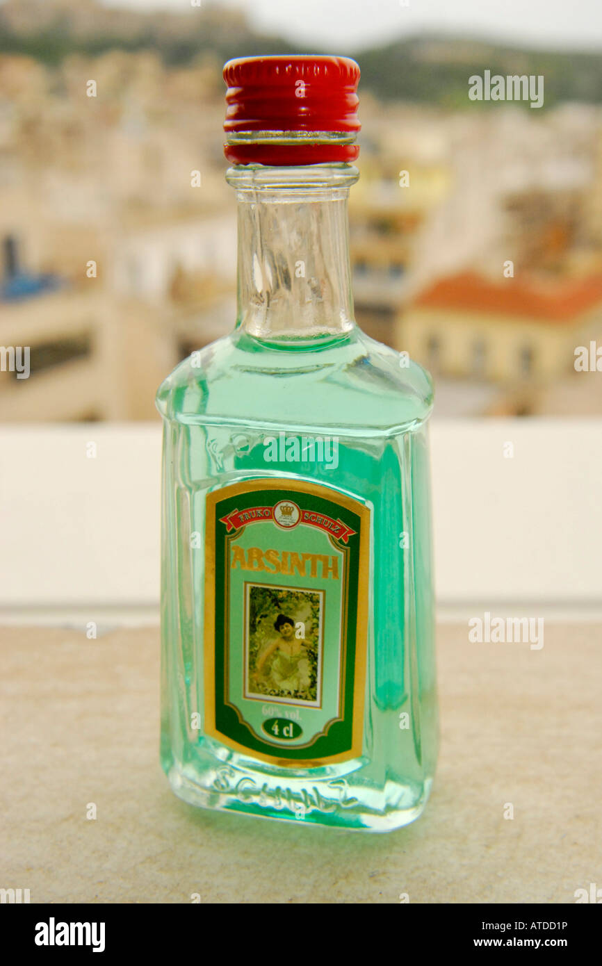 Absinthe bottle on window sill overlooking Athens Greece Stock Photo ...