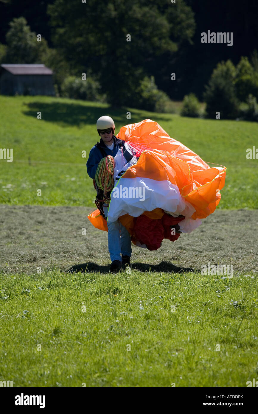 Paraglider and windsock Stock Photo - Alamy