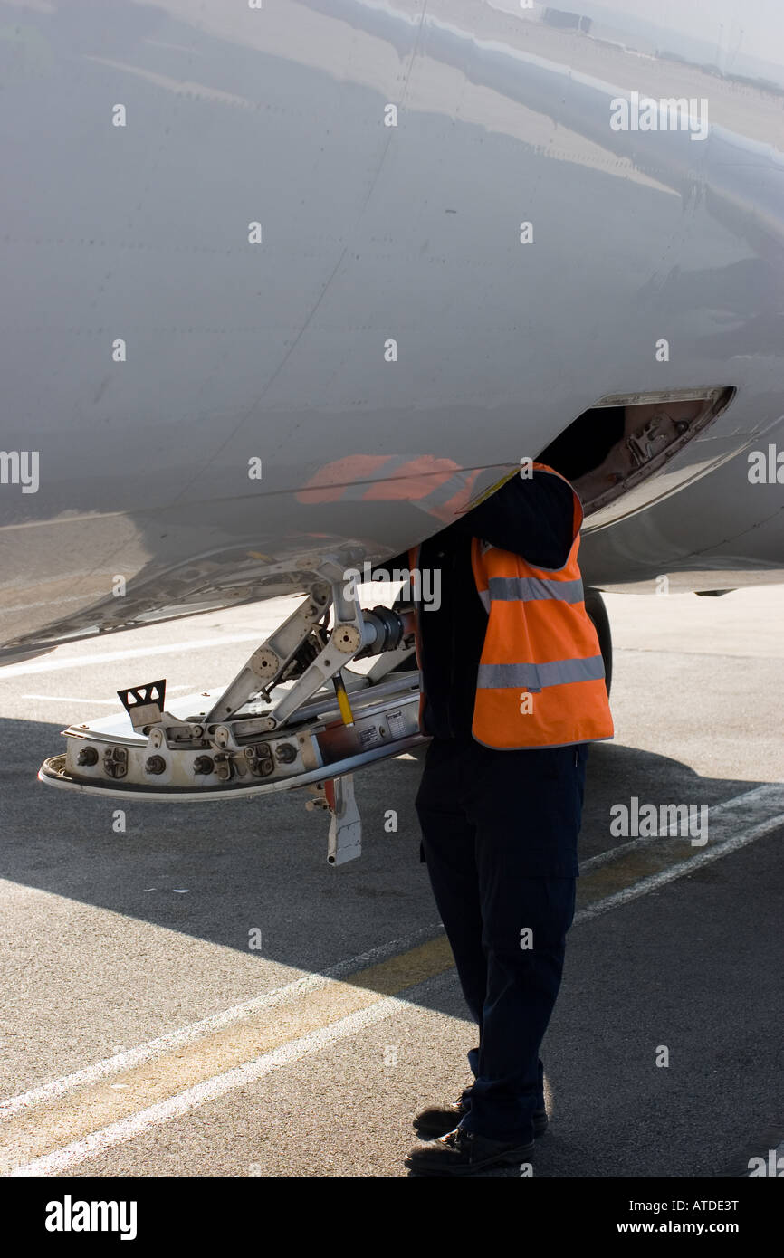 Luggage hatch of an airplane Stock Photo - Alamy