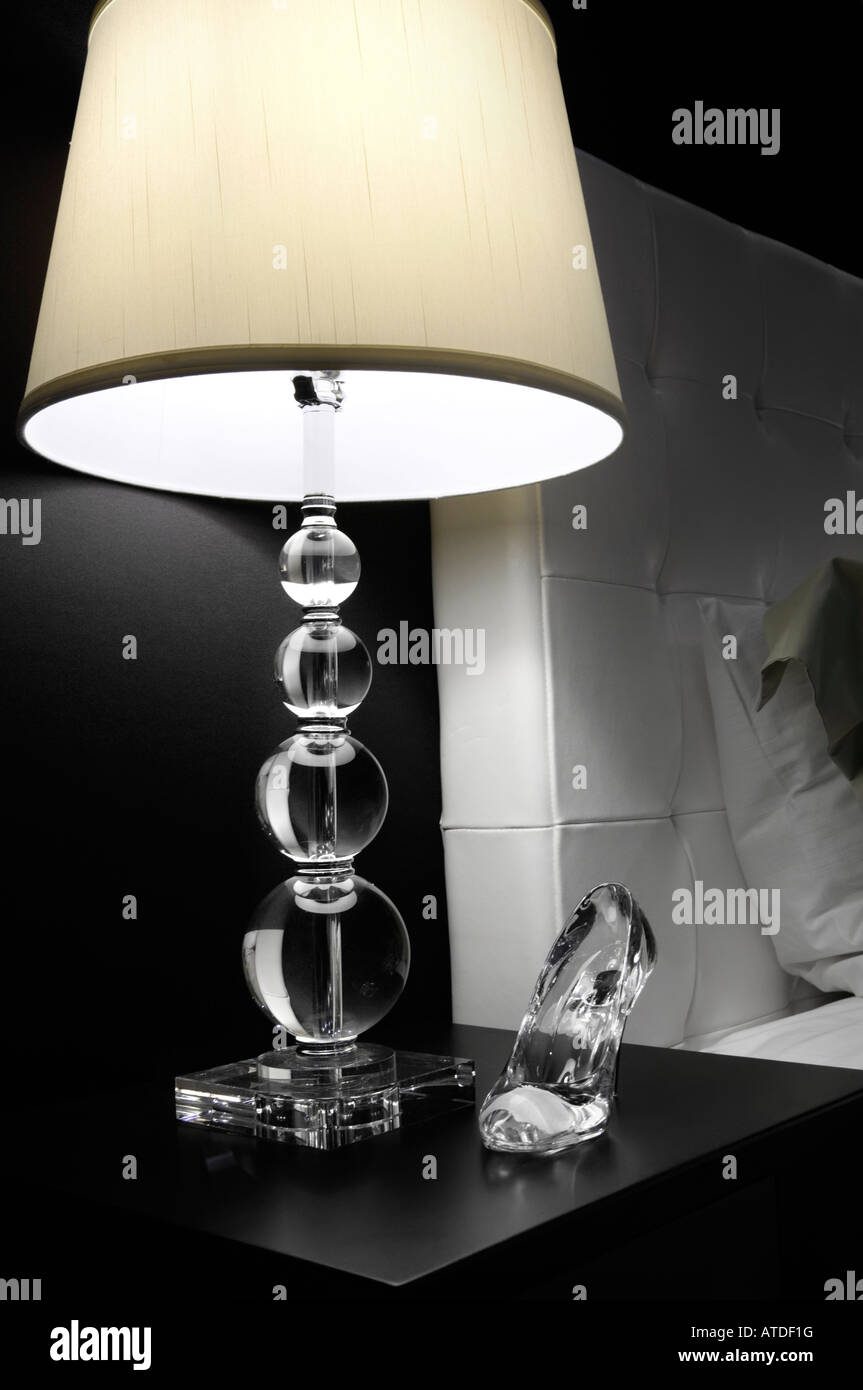 Crystal shoe under a night lamp Stock Photo - Alamy