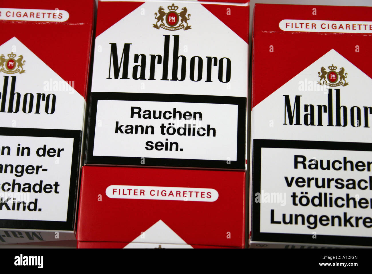 Cigarette box with warning reference Stock Photo - Alamy