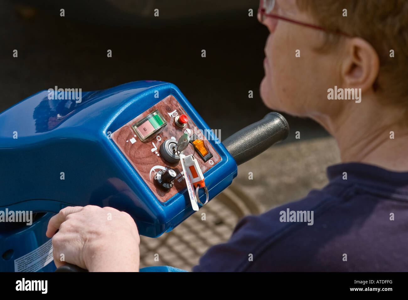 Power wheelchair controls close-up person in wheelchair Stock Photo - Alamy