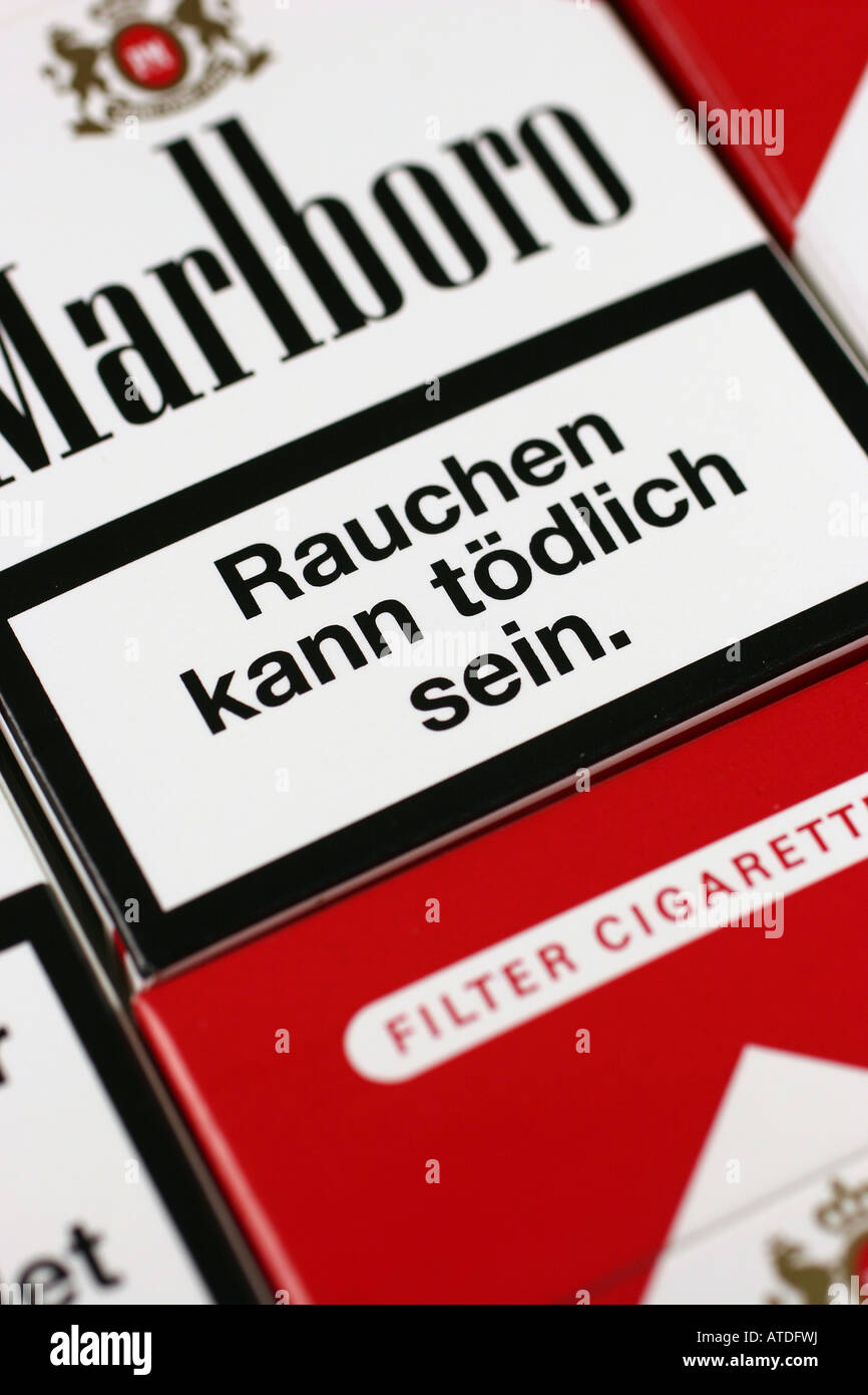 Cigarette box with warning reference Stock Photo - Alamy