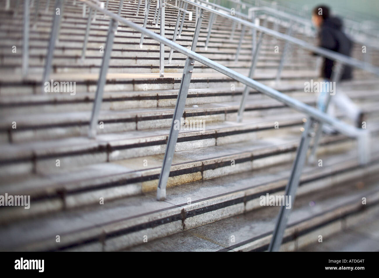 A boy running up some steps Stock Photo - Alamy