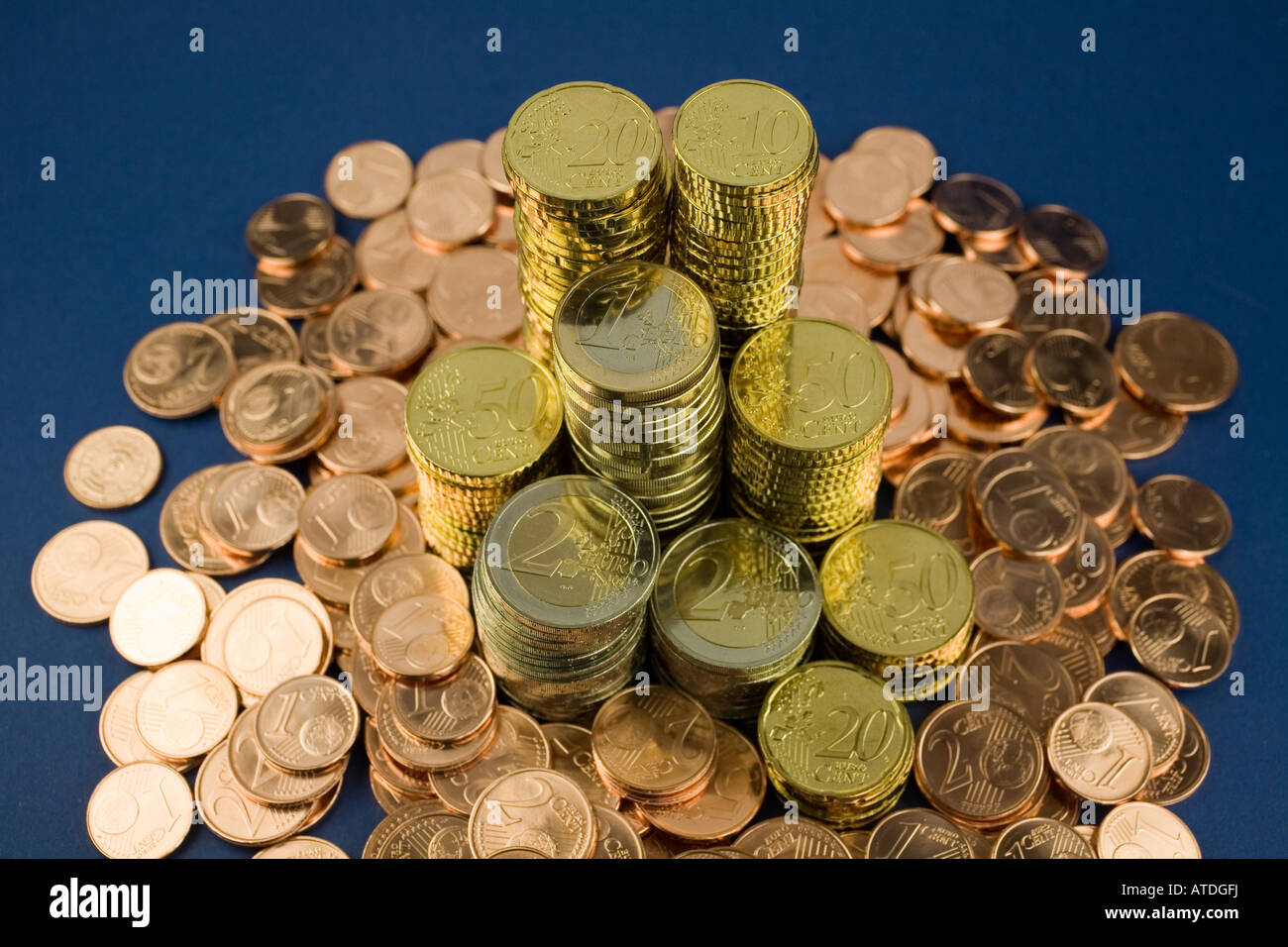 Heap of money and money pile Stock Photo - Alamy