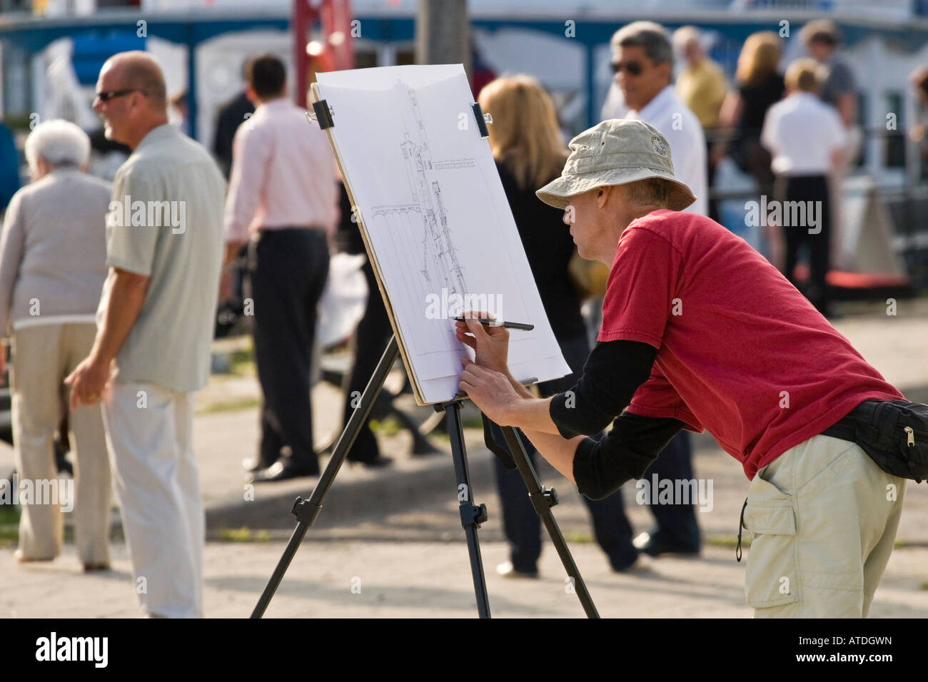 Man drawing a picture outdoors Ontario lakeside Toronto Canada Stock ...