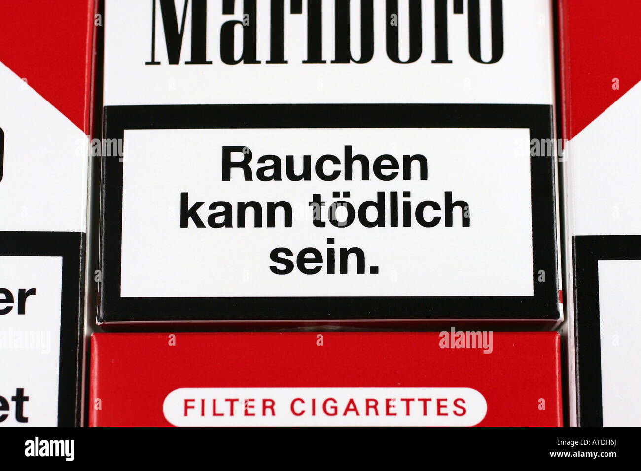 Cigarette box with warning reference Stock Photo - Alamy