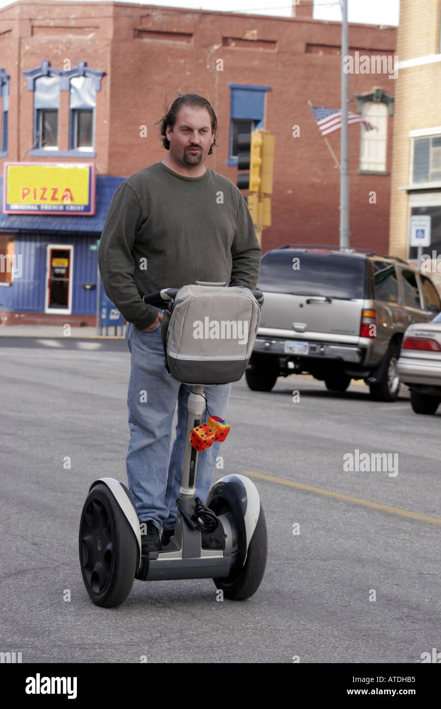 man on personal transportation device Stock Photo - Alamy