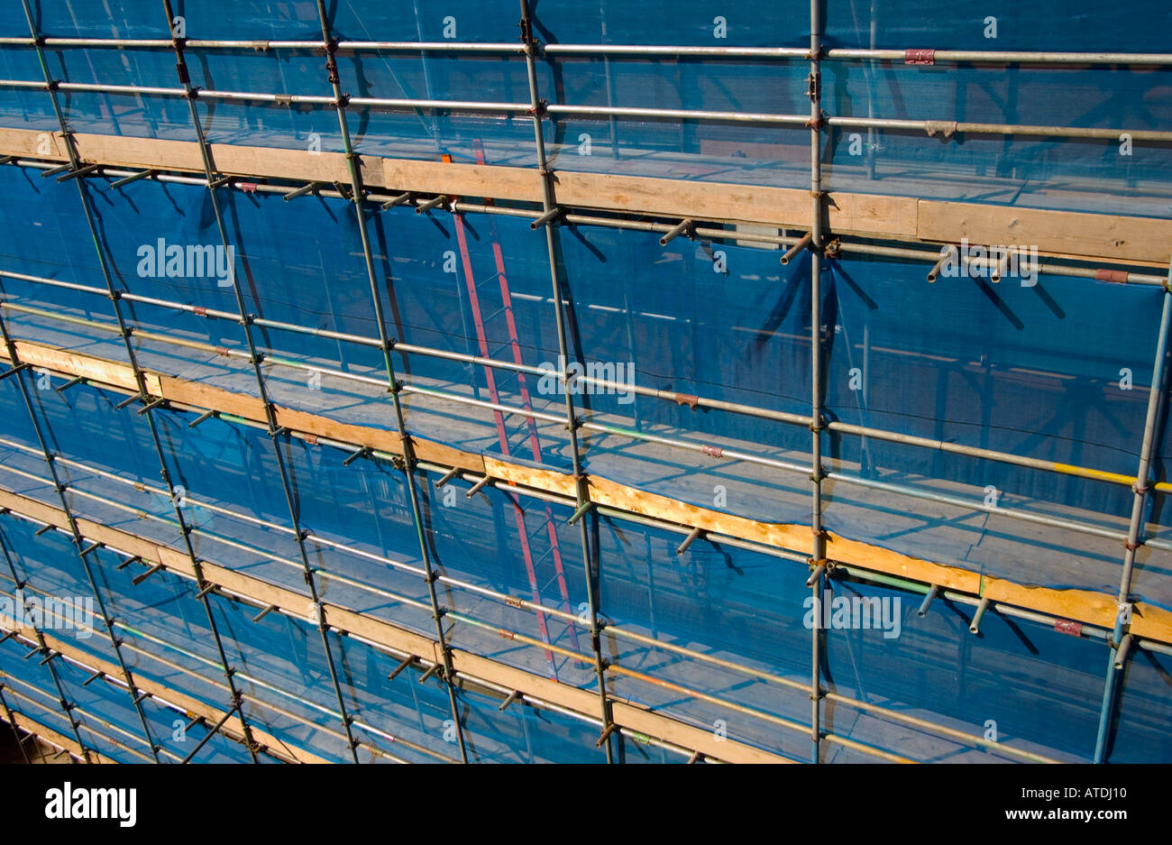Scaffolding on the side of a building Stock Photo - Alamy