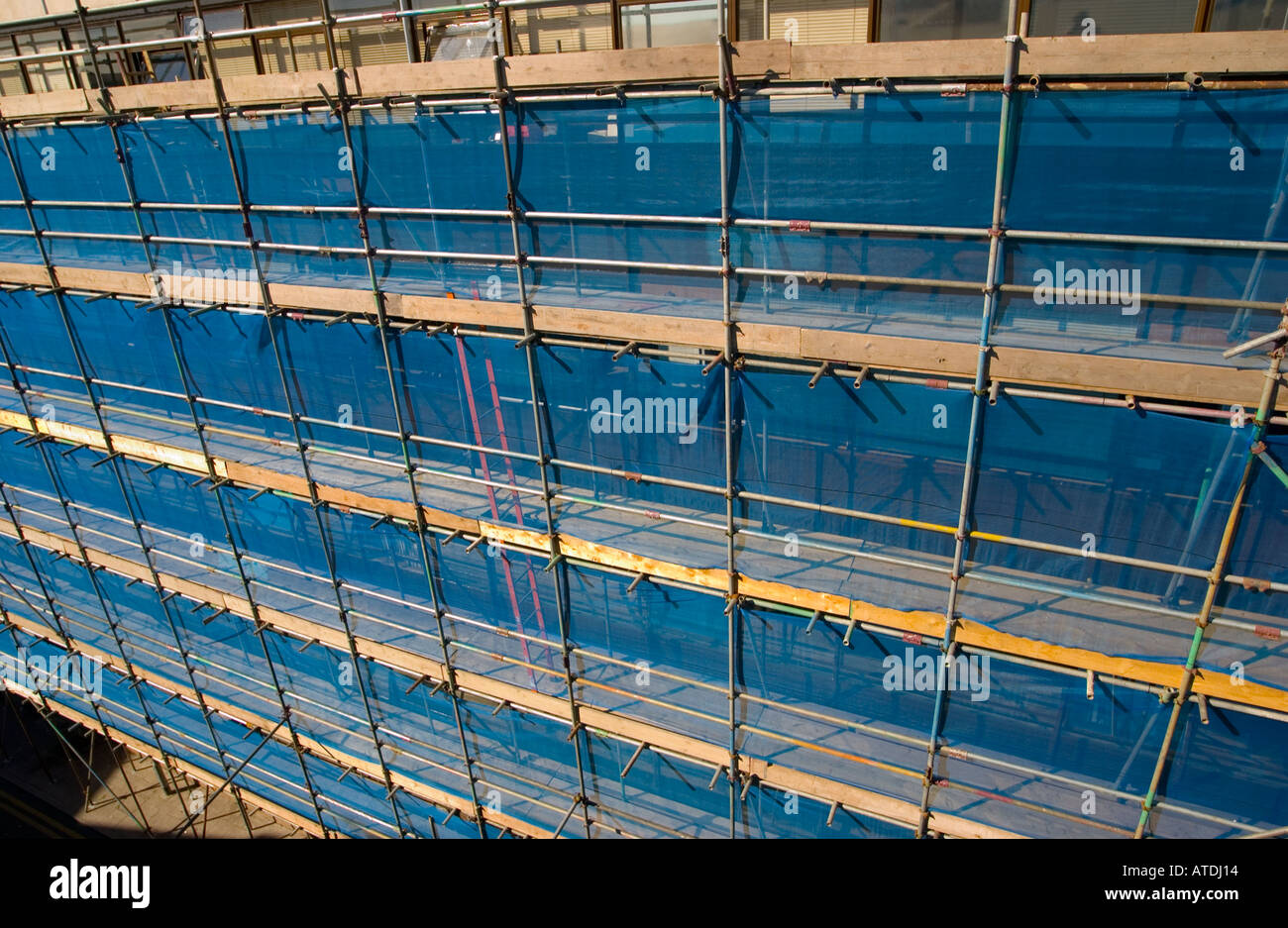 Scaffolding on the side of a building Stock Photo - Alamy