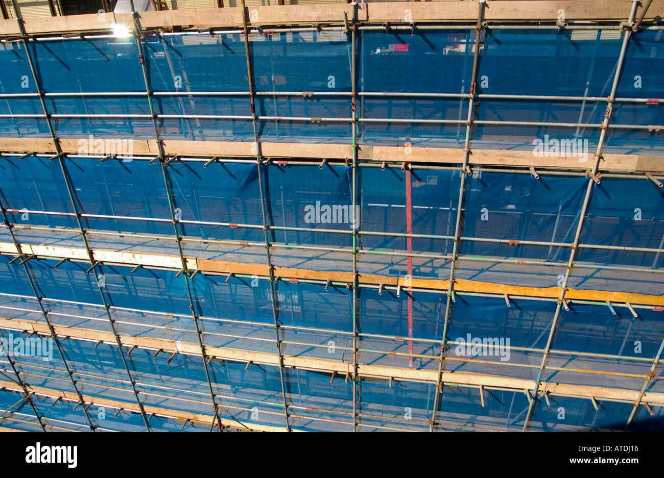 Scaffolding on the side of a building Stock Photo - Alamy