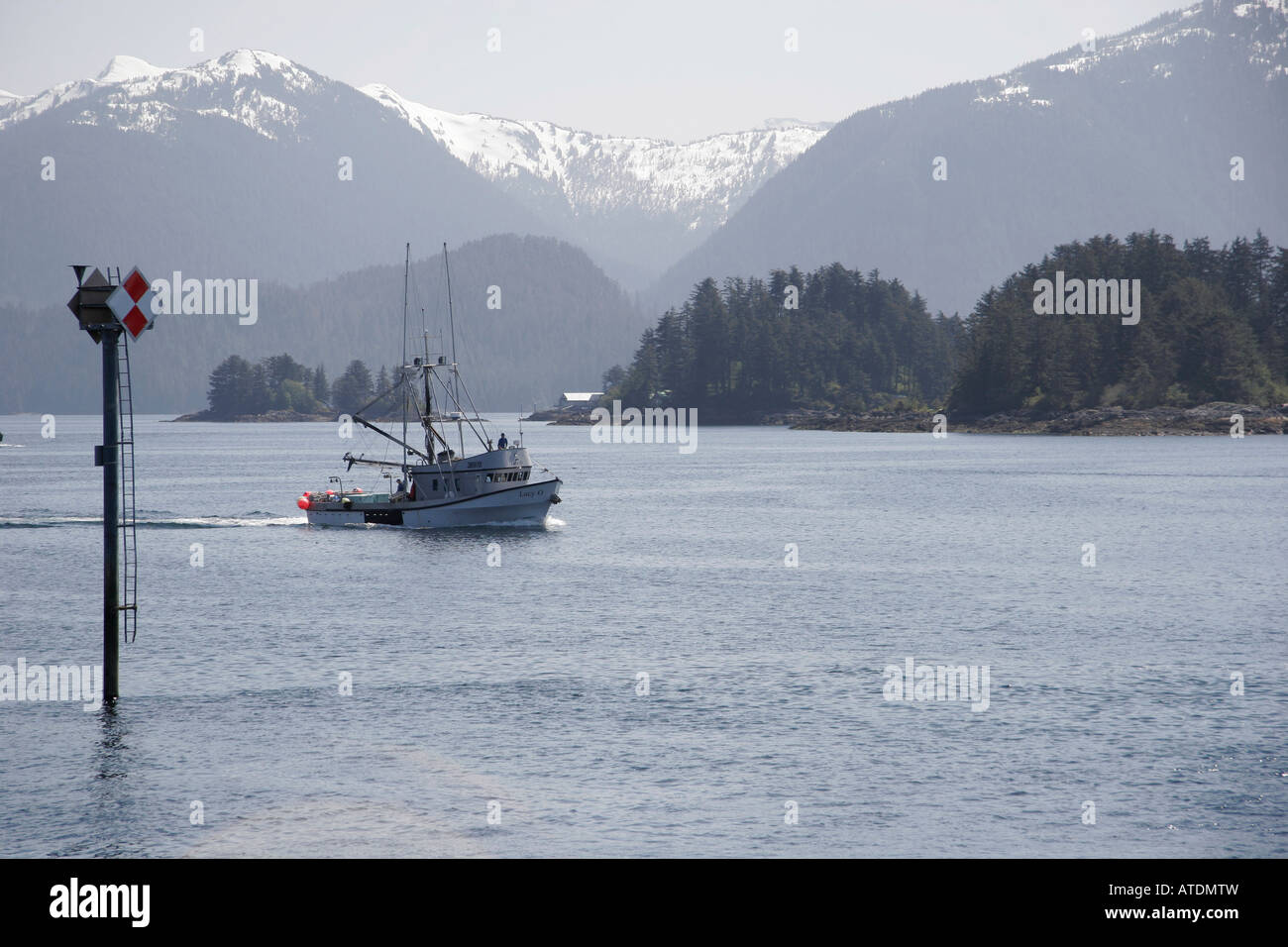 Commercial fishing boat returning Alaska USA Stock Photo - Alamy